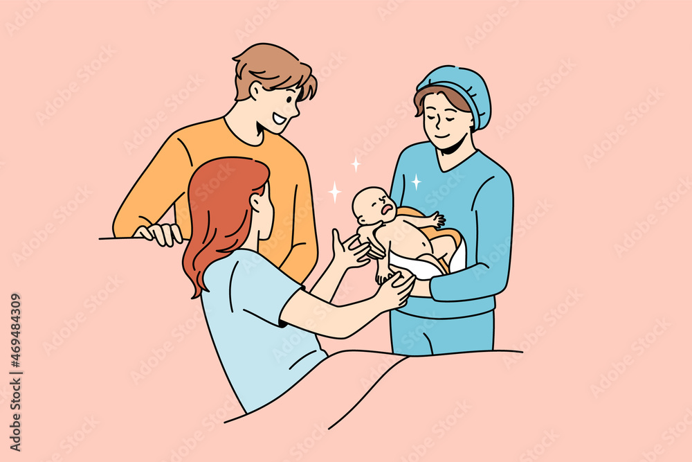 Giving birth and parenthood concept. Young happy mother lying in bed ...