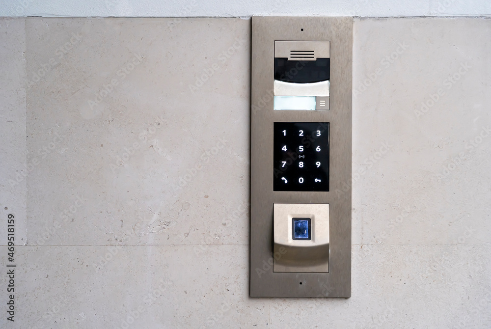 Matte metal intercom call panel with white digital buttons and ...