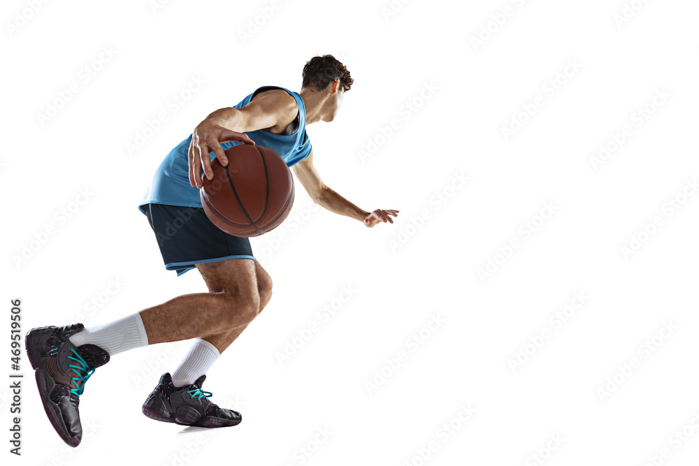 One professional basketball player in blue sports uniform training with ...