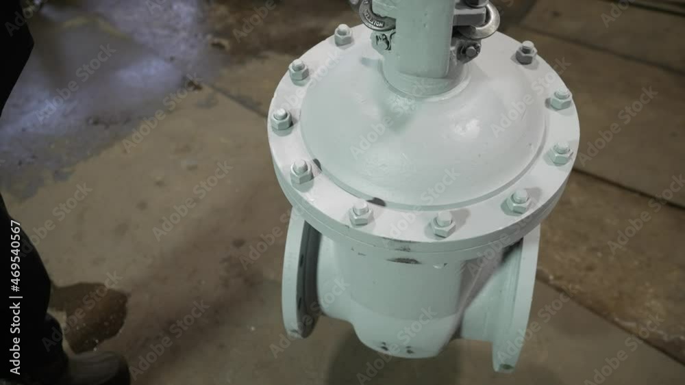 Manufacturing of steel gate valves in an industrial plant. Industrial ...