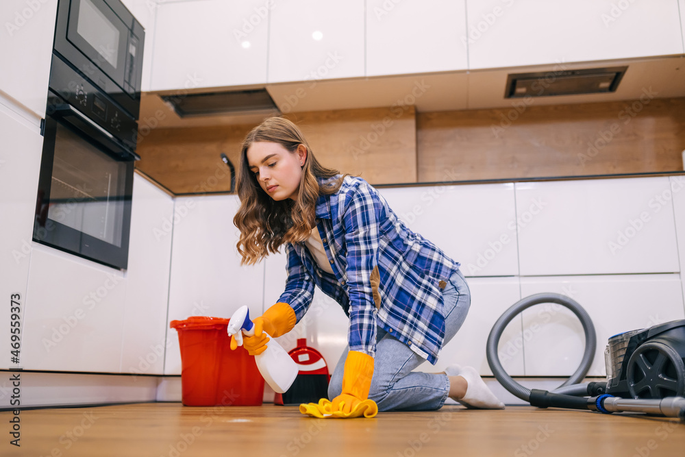 people, housework and housekeeping concept - close up of woman in ...
