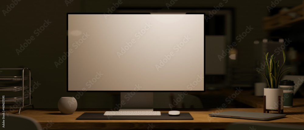Modern pc computer white screen mockup in dark office room. Stock Photo ...