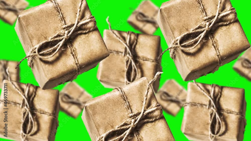 Video Stock Flying Dark Wrapping eco Christmas packages with brown ...