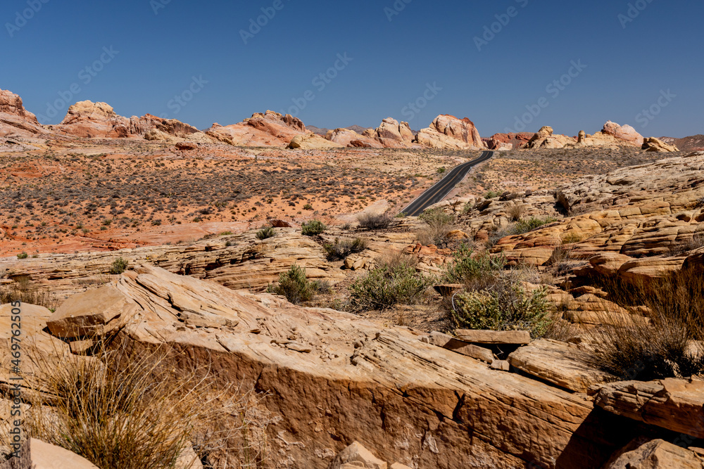 Mouse's Tank Road winds through the arid landscape of high desert and ...