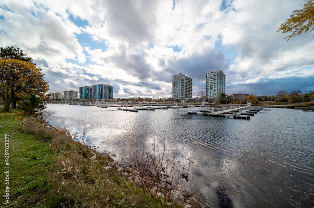 Barrie waterfront centennial park lake shore path with green grass and ...