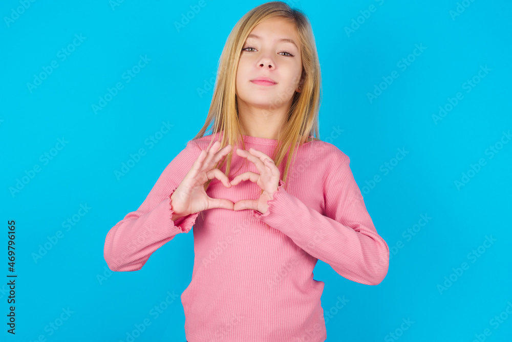 Serious MODEL keeps hands crossed stands in thoughtful pose ...