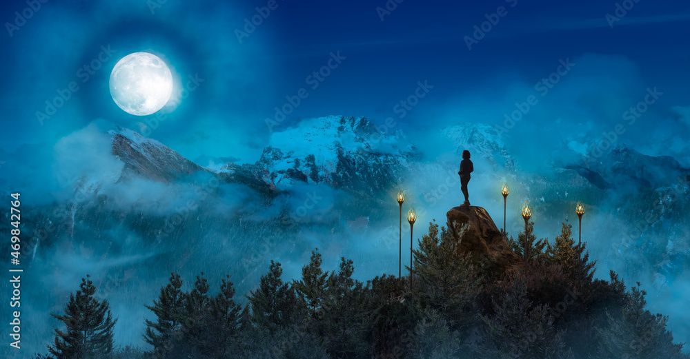 Magical night scene in nature. Mountain landscape with big moon in sky ...