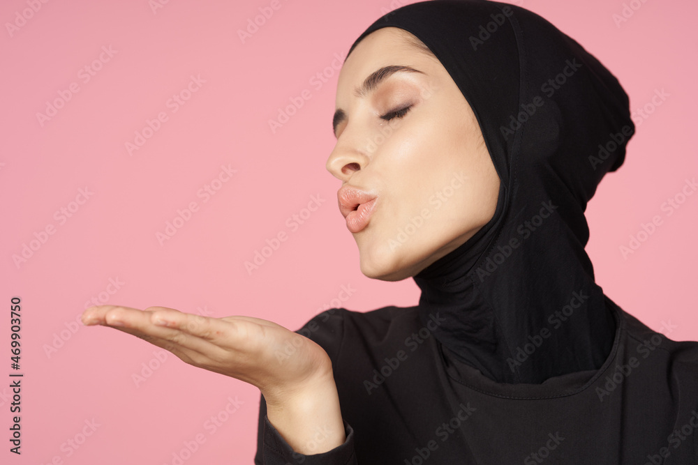 cheerful muslim woman black hijab posing hand gesture pink background ...