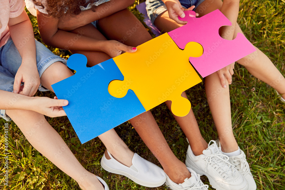 Diverse kids playing with puzzle together Stock Photo | Adobe Stock
