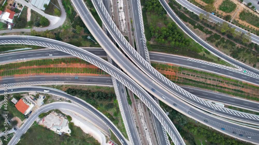 Aerial top down hyper lapse view of a highway flyover with elevated ...