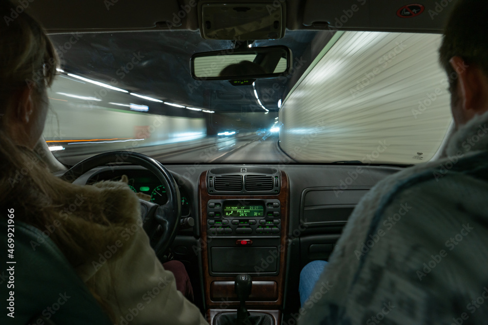 Car driving at night. Inside the car view, Caucasian female driver and ...