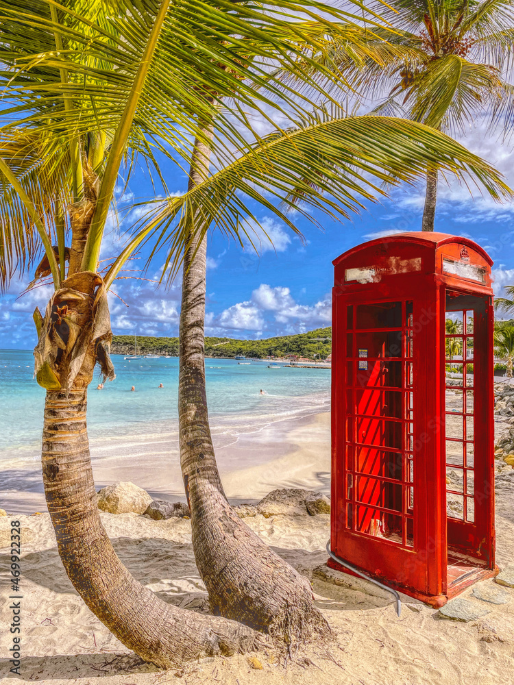 red telephone box on the beach with two palm trees Stock Photo | Adobe ...