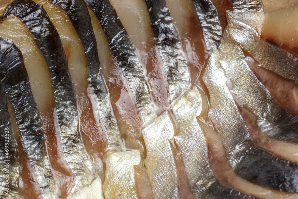 Food background, fish smoked mackerel fillet cut into slices, seafood ...