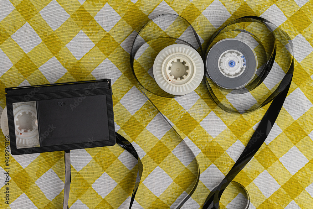 damaged video Magnetic tape, old vhs ribbon tape on a vintage ...