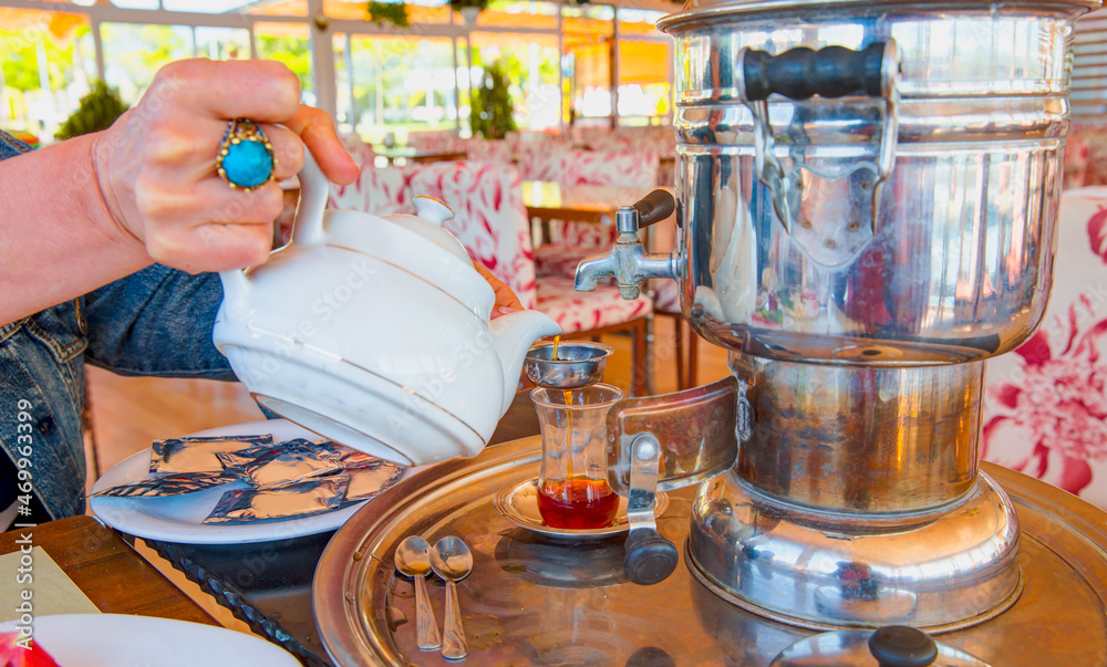 Traditional drinks concept - Samovar and Turkish tea enjoyment at ...
