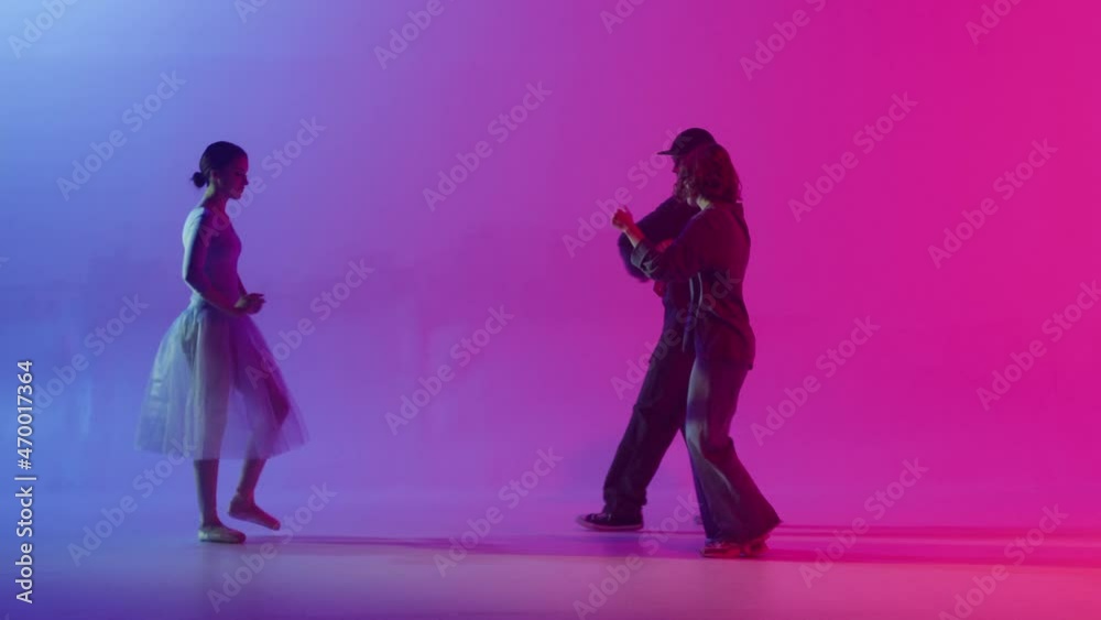 Dance battle, Couple dancing hip hop and woman showing ballet on pink ...