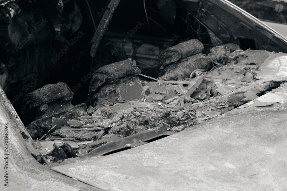 Melted head restraints and rear window of burned out car. Stock Photo ...