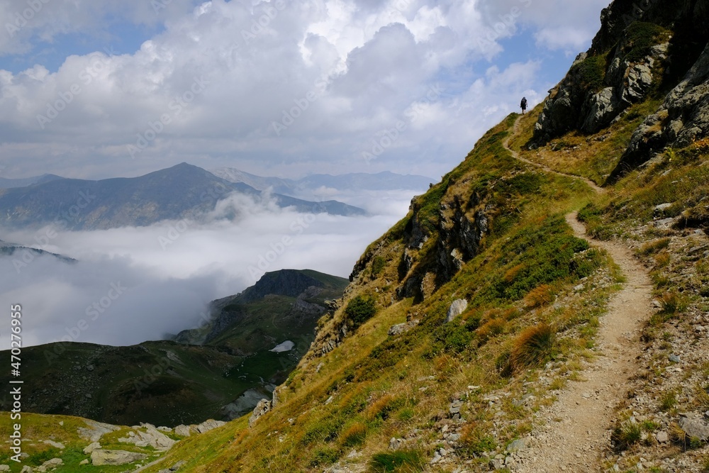 Beautiful mountain view above clouds during hiking on peak Djeravica ...