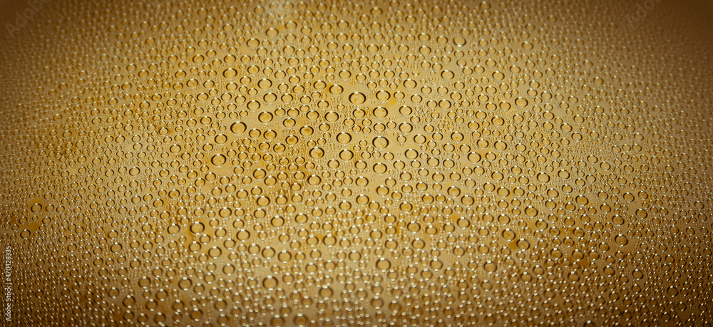 Water vapor condenses on the yellow glass forming a unique circular ...