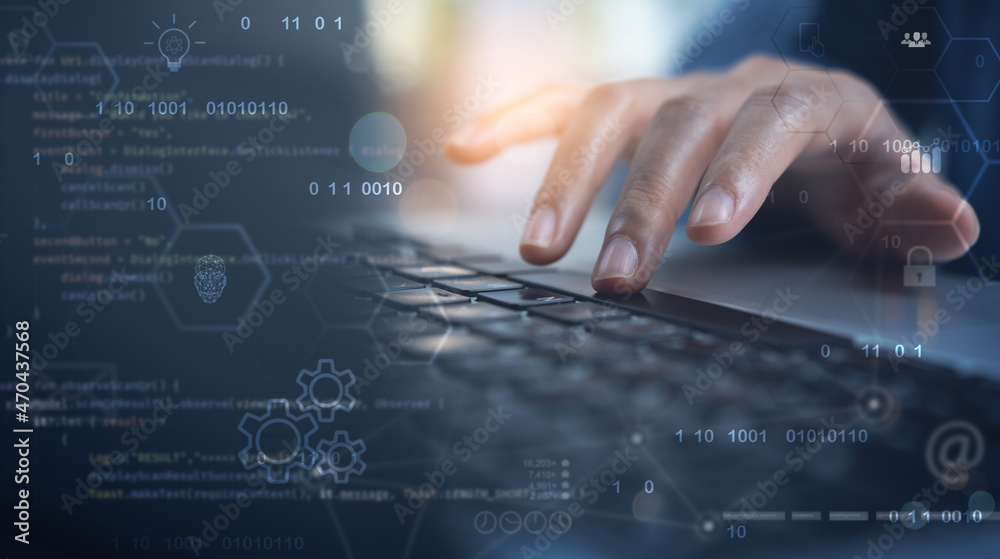 Business woman working on laptop computer with digital diagram ...