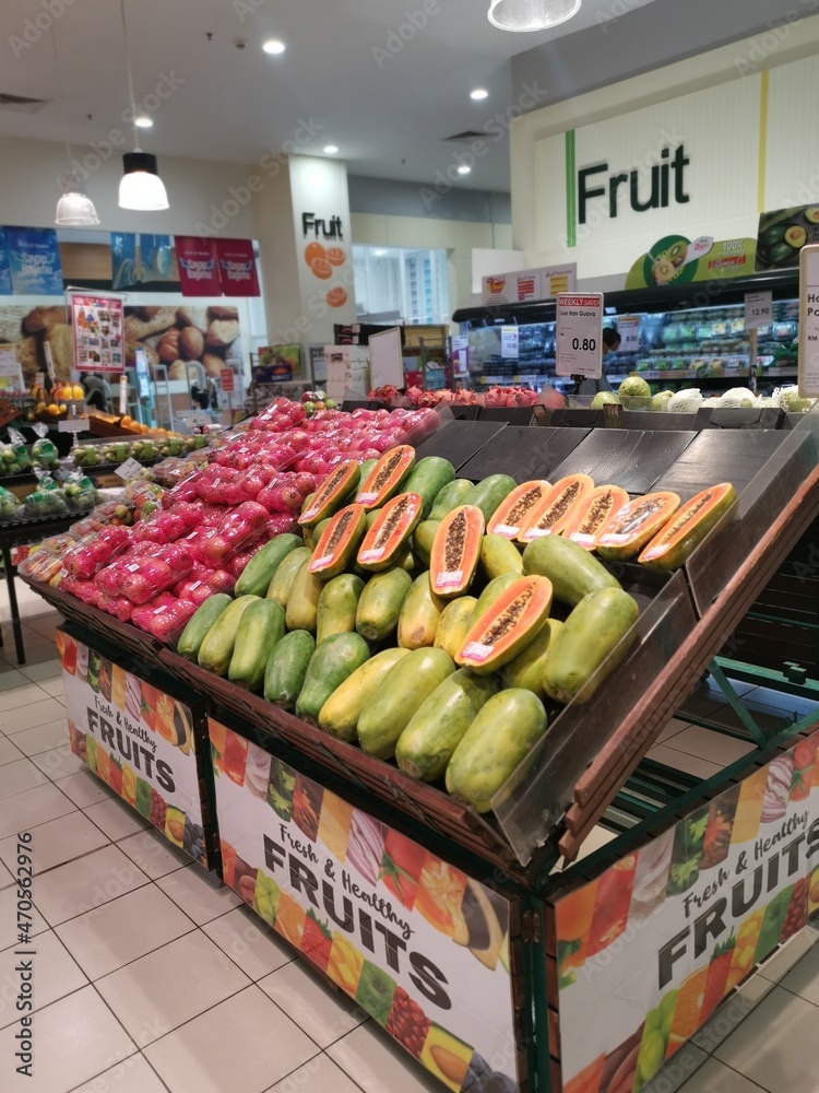 Varieties of imported and local fruits wrapped in package for sale on ...