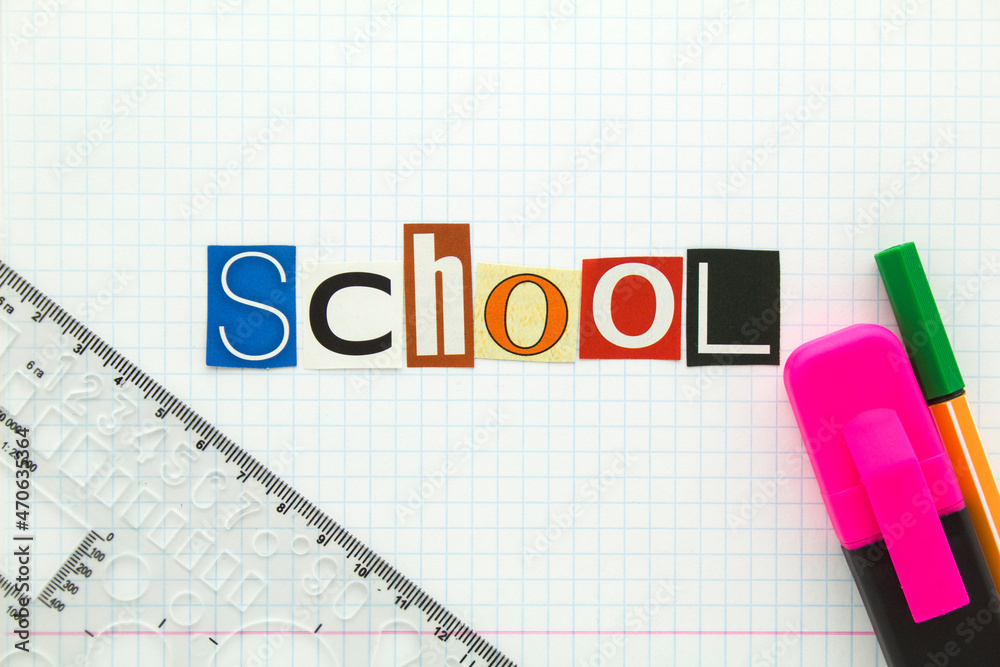 School - word from cutting magazine clippings on white checkered ...