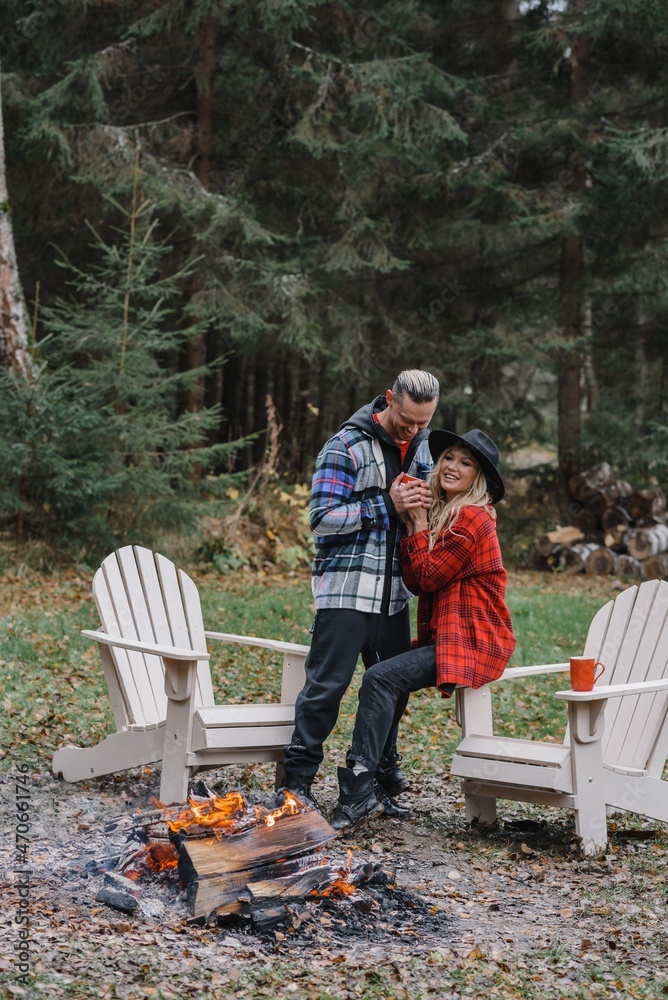 couple kissing. lovers tenderness steam white on path the forest ...