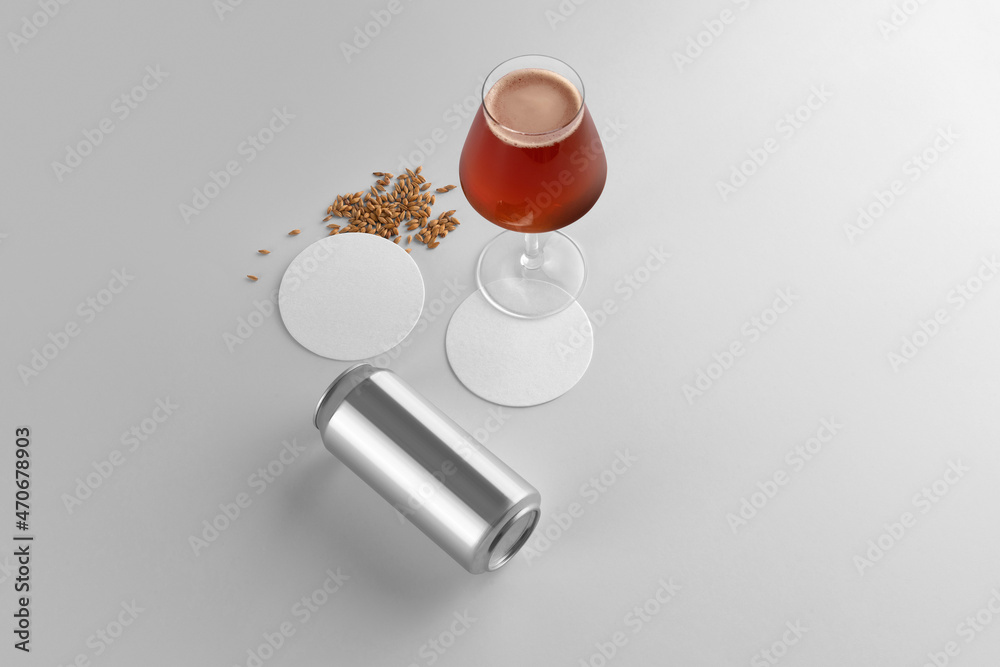 Blank beer can, glass with beer, beer pads, on a white background ...
