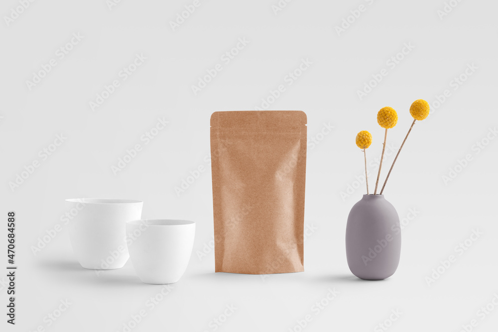 Blank tea bag packaging, teacups, bag, flowers, on a white background ...