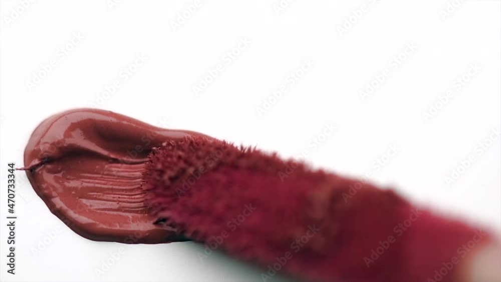 Lipgloss make-up smudge, smear. Cosmetic liquid lip gloss, lipstick ...