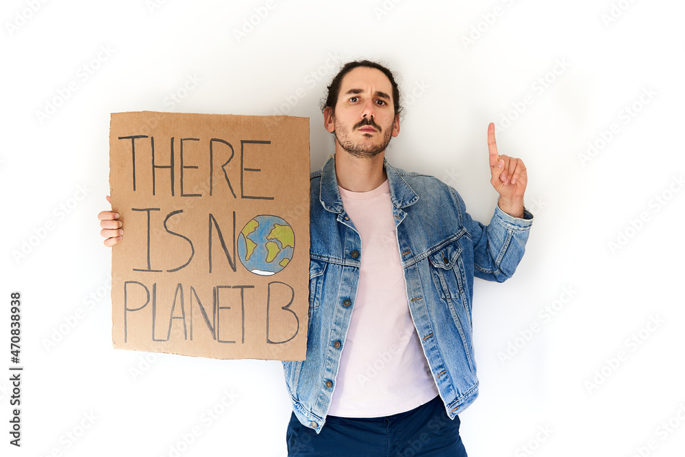 Stop climate change concept. Climate activist holding there is no planet b sign over white ...