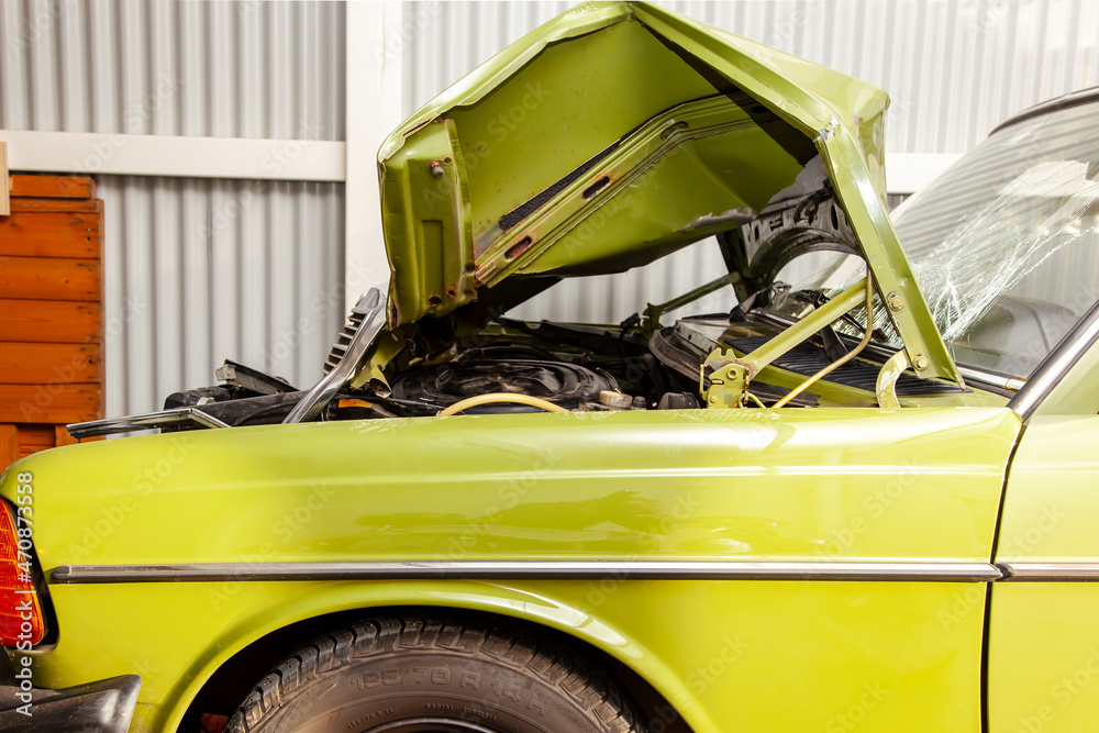 Accident, Car crash collision with open car hood. Closeup shot of a ...