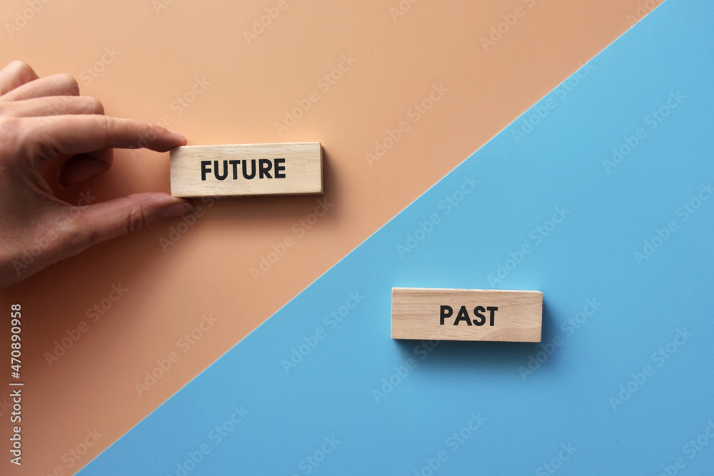 Wooden plates with inscriptions: past and future. Symbol of the choice ...