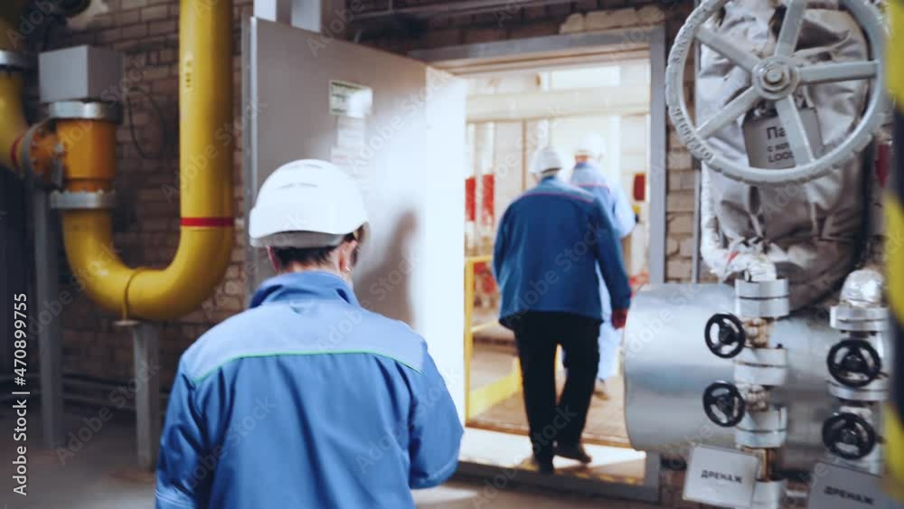 Workers go inside the production of highly efficient chemical products ...
