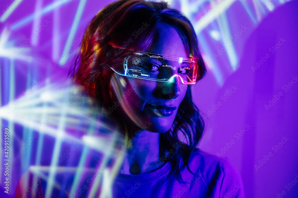 Woman In Neon Lights with Led Glasses Stock Photo | Adobe Stock