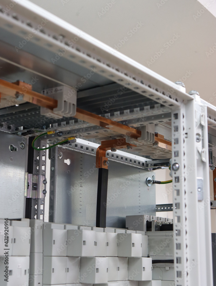 Copper busbar for protective grounding in the electrical panel. Stock ...
