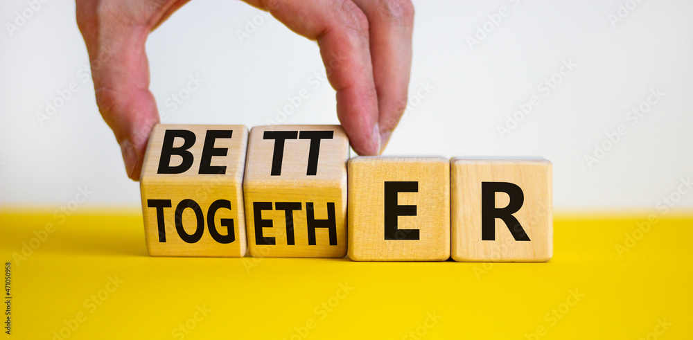 Better together symbol. Businessman turns cubes and changes the word ...