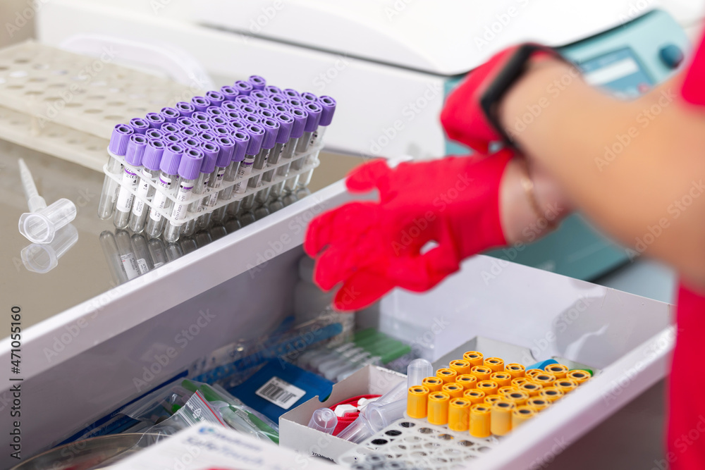Test tube in scientist hand in laboratory. Doctor in uniform working ...