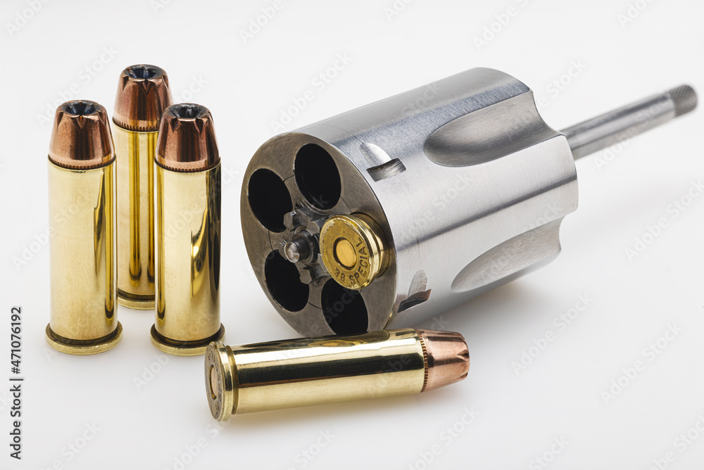 .38 special gun bullets with stainless revolver cylinder on white ...