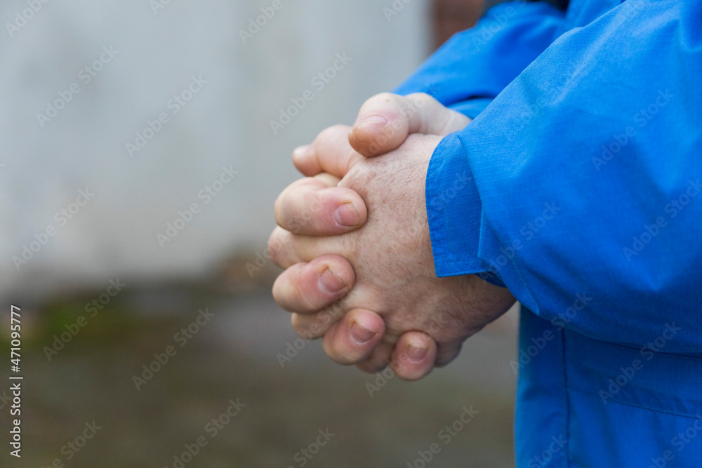 The man folded his arms in prayer to God. The man is praying Stock ...