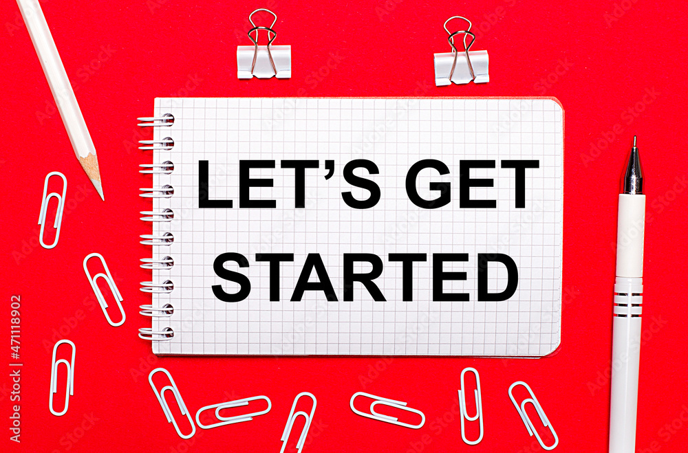 On a bright red background, a white pencil, white paper clips, and a ...