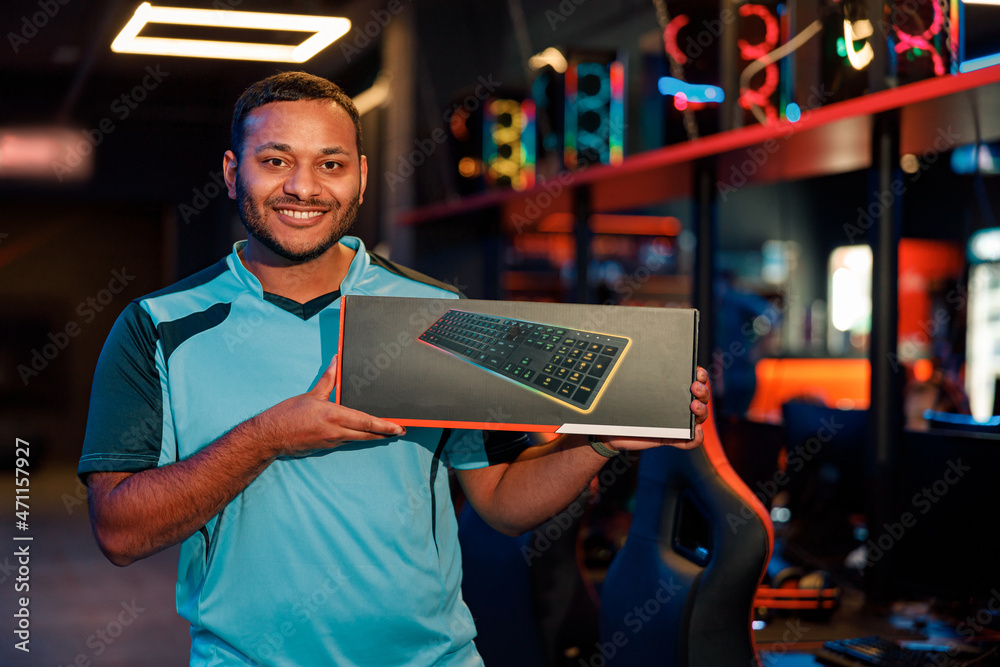 Happy African male cybersport gamer won esports tournament and got ...