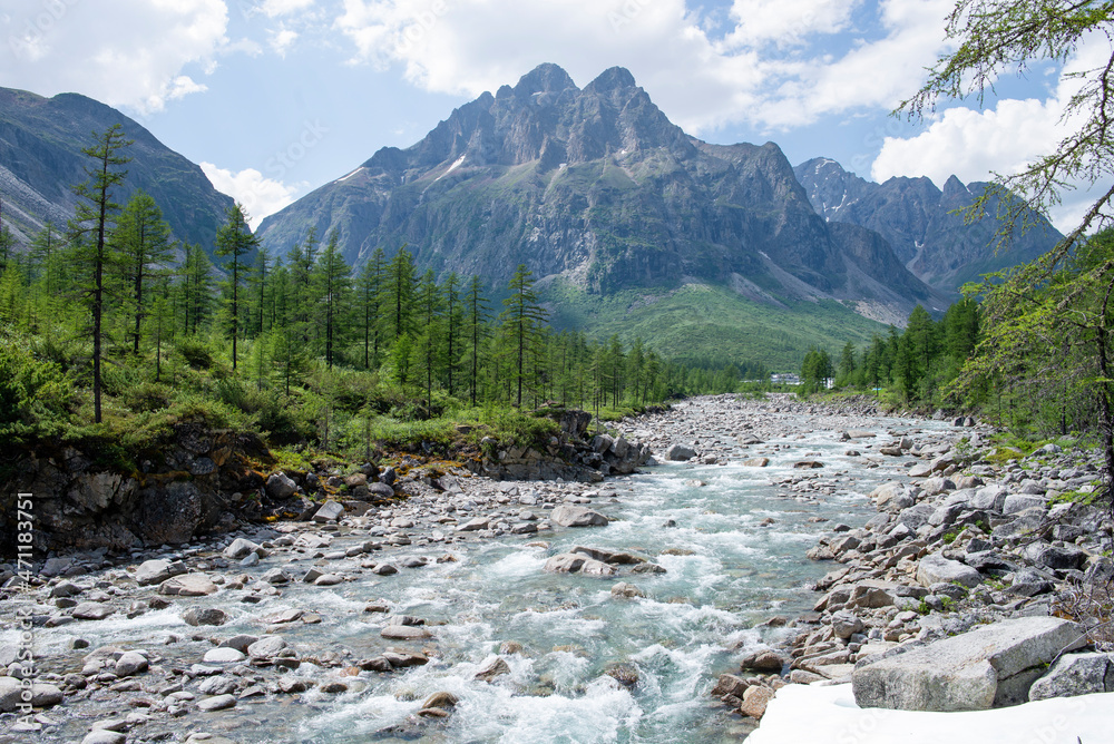 The beautiful valley of the Middle Sakukan river against the backdrop ...
