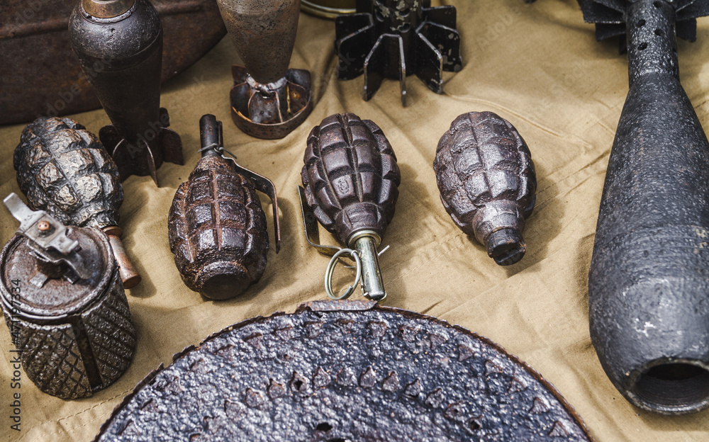 Old hand grenades and other weapons memorabilia. Vintage military ...