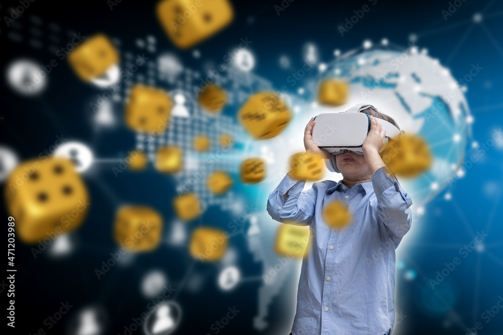 Metaverse Technology concepts. A boy play VR virtual reality goggle and experiences of metaverse ...
