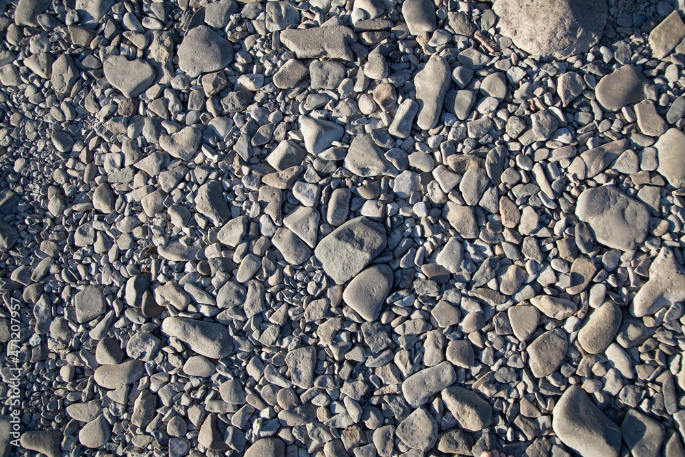filled frame close up background wallpaper shot of grey cobble rock ...