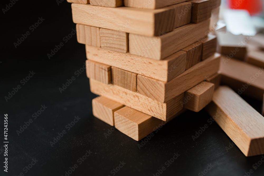 Education, risk, development and growth concept. jenga game. The ...