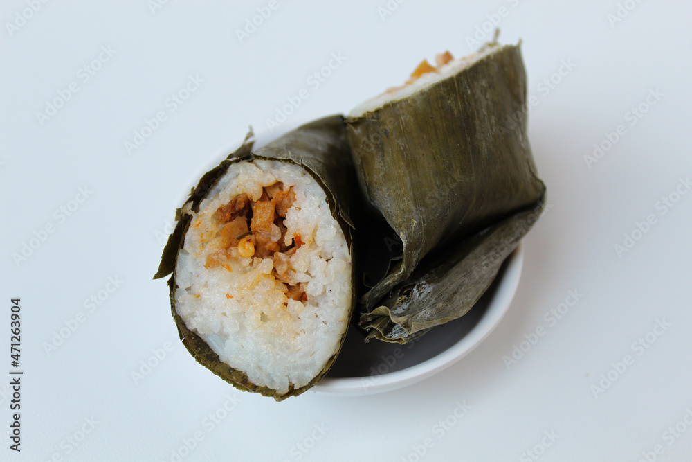 Arem-arem is a traditional snack from Indonesia. Made from sticky rice ...