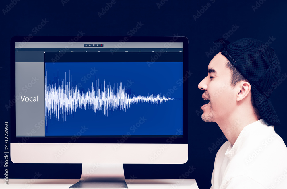 vocal, voice recording concept. asian male singer singing beside ...