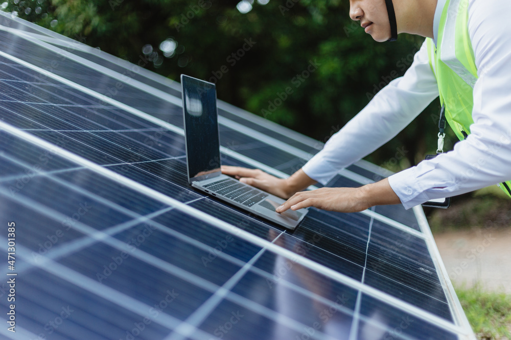 Engineer check data from the sensor of solar cells panel Stock Photo ...